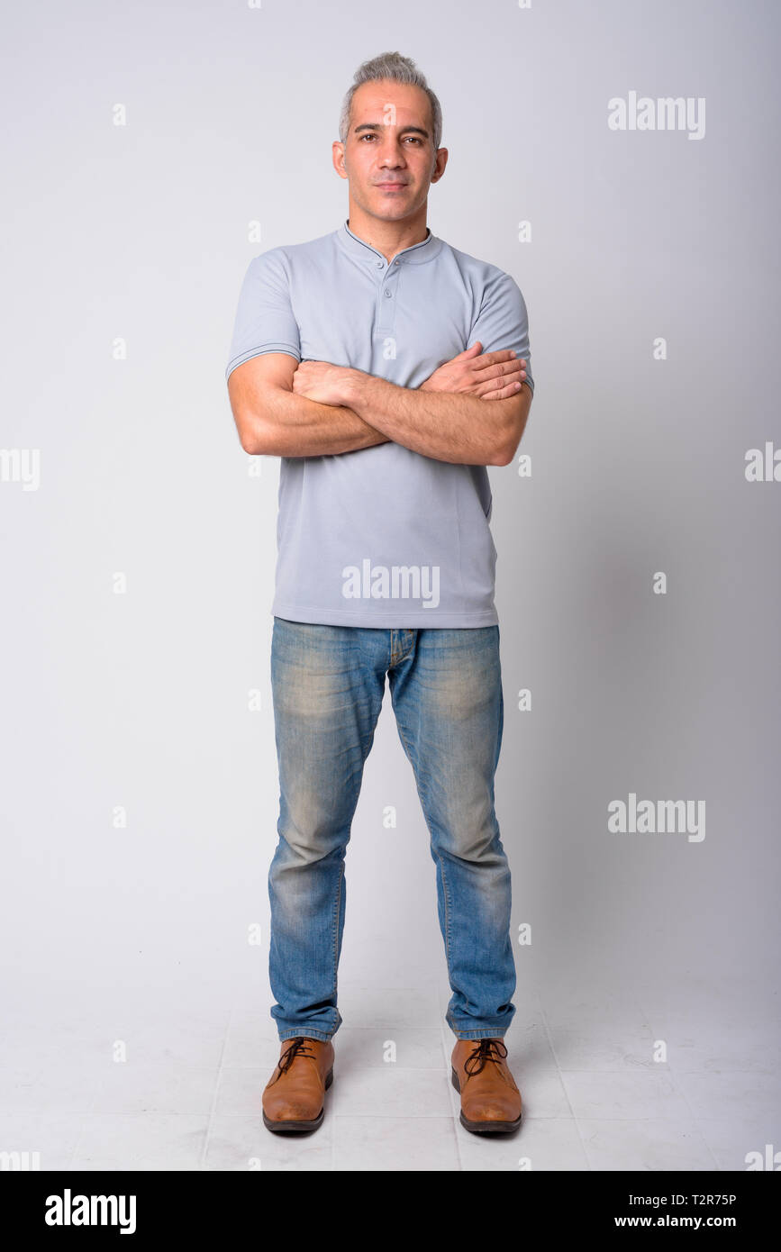 Studio shot of handsome Persian man against white background Stock ...