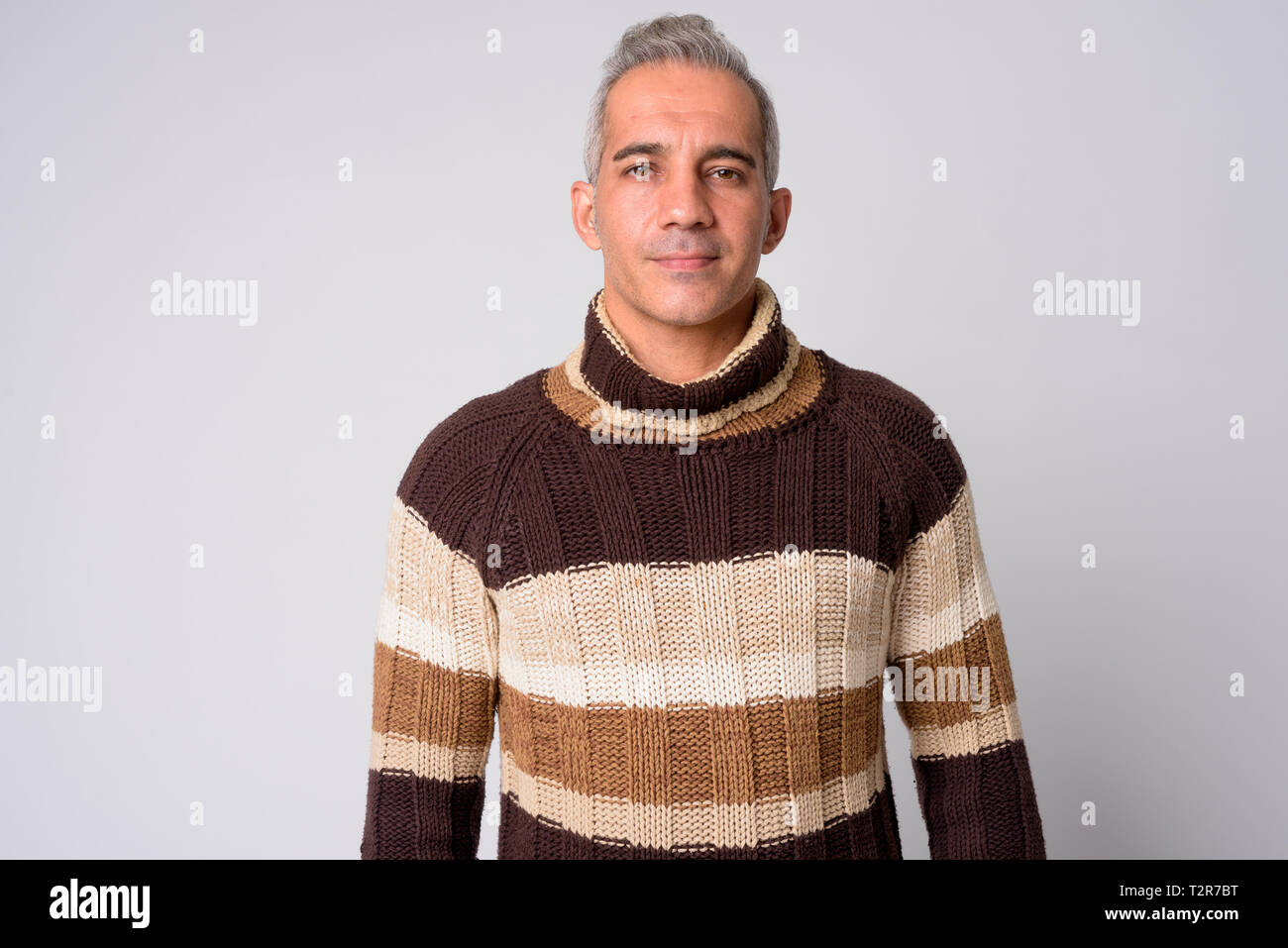 Studio shot of handsome Persian man against white background Stock ...