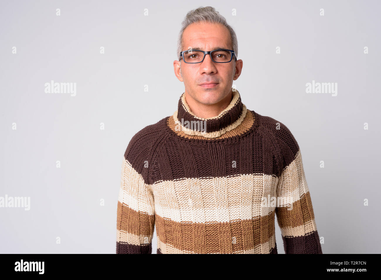 Studio shot of handsome Persian man against white background Stock ...