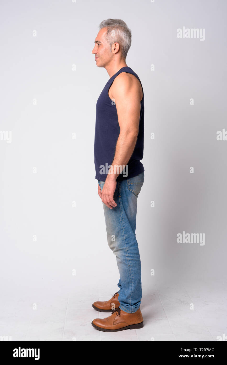 Studio shot of handsome Persian man against white background Stock ...