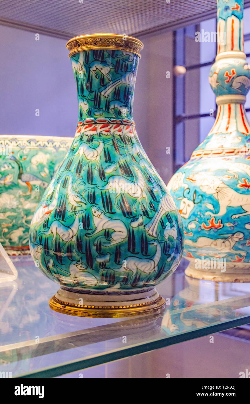 Glazed, painted porcelain vase from Turkey. Depicts various animals ...