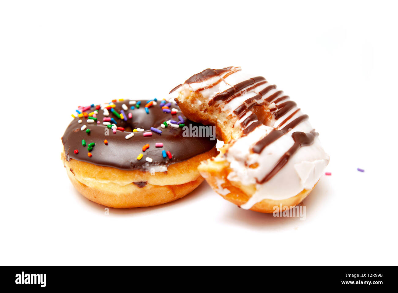 chocolate, caramel and mixed donuts with colorful sparkle Stock Photo ...