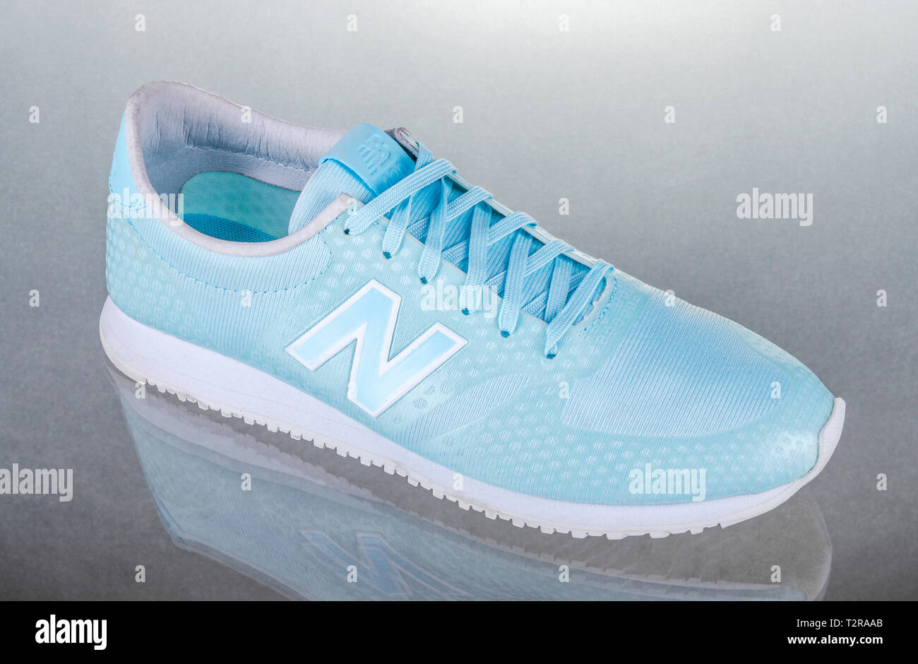 New Balance sports shoes isolated on gradient background Stock Photo ...