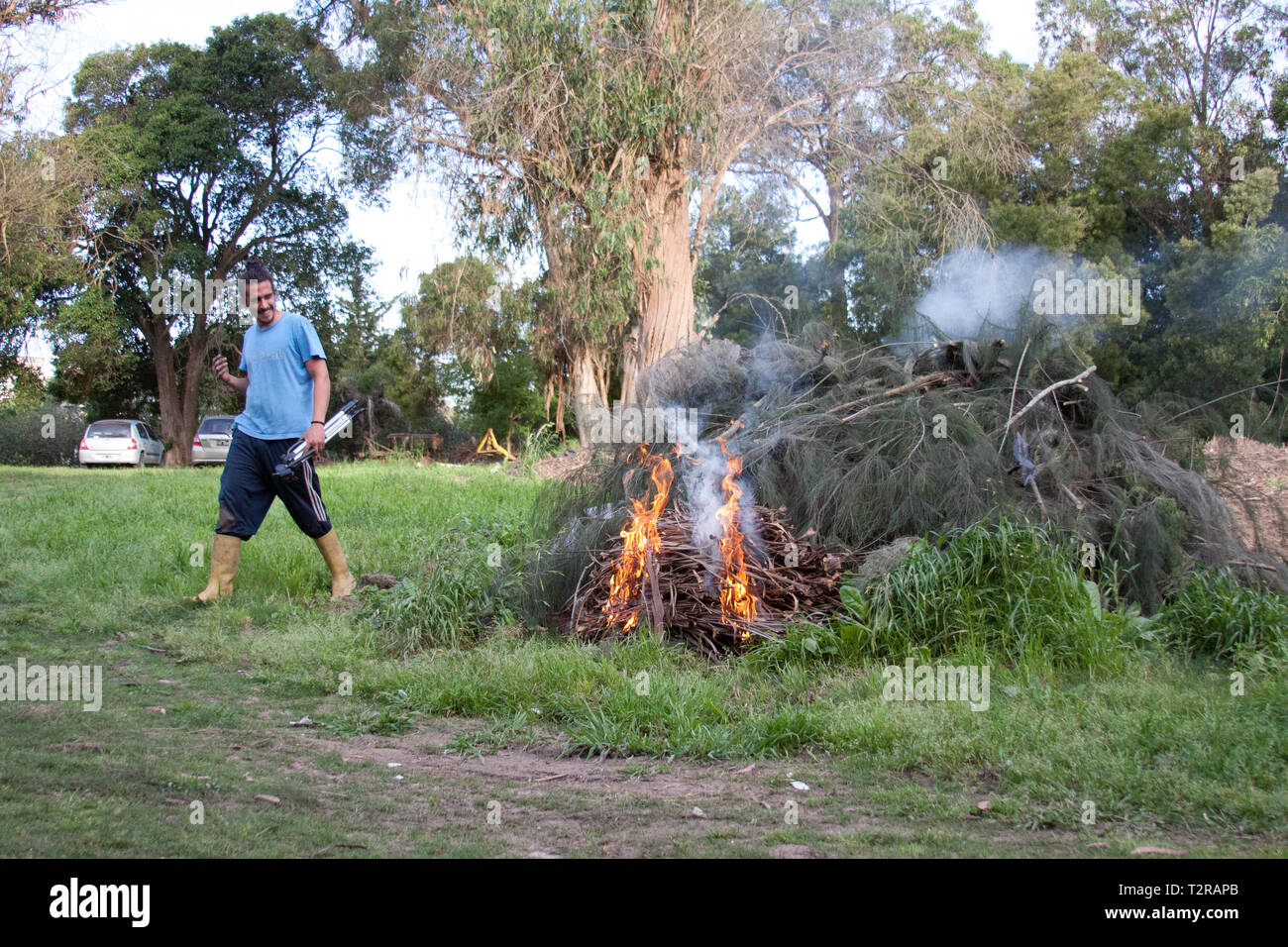 Man burning vegetation hi-res stock photography and images - Alamy