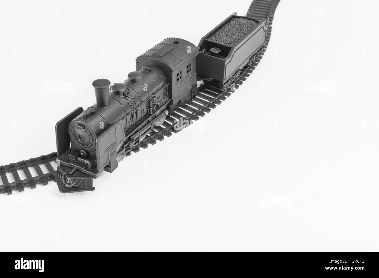 Black painted toy steam engine model. For off track, financial crash ...
