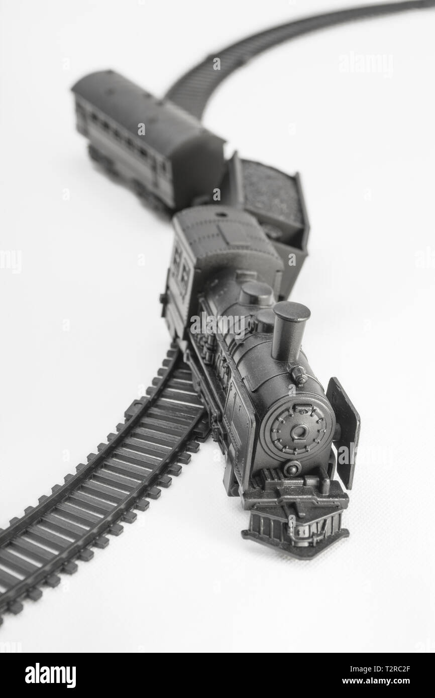 Black painted toy steam engine model. For off track, financial crash ...
