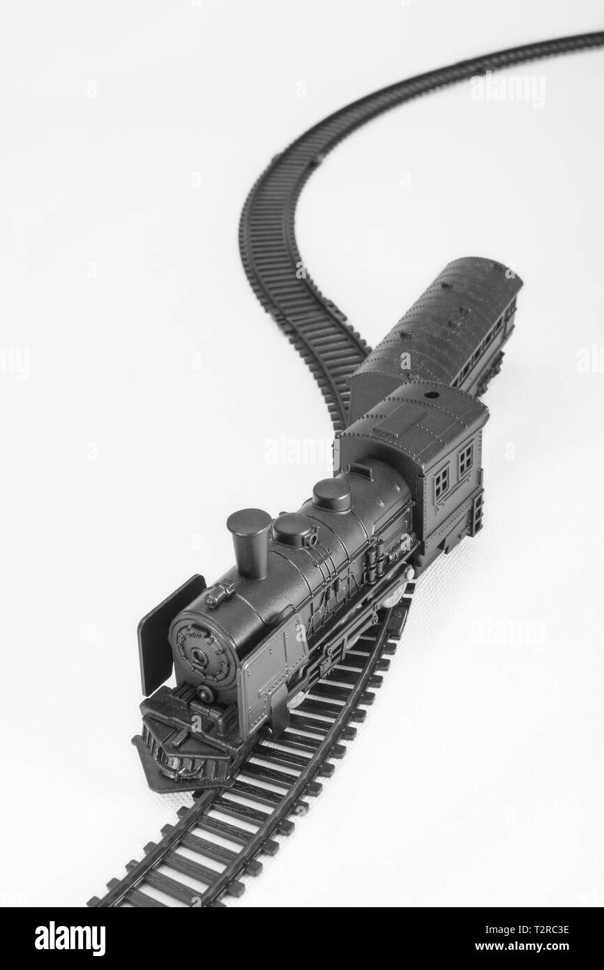 Black painted toy steam engine model. For off track, financial crash ...