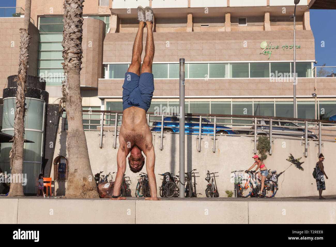 Beachfront handstand hi-res stock photography and images - Alamy