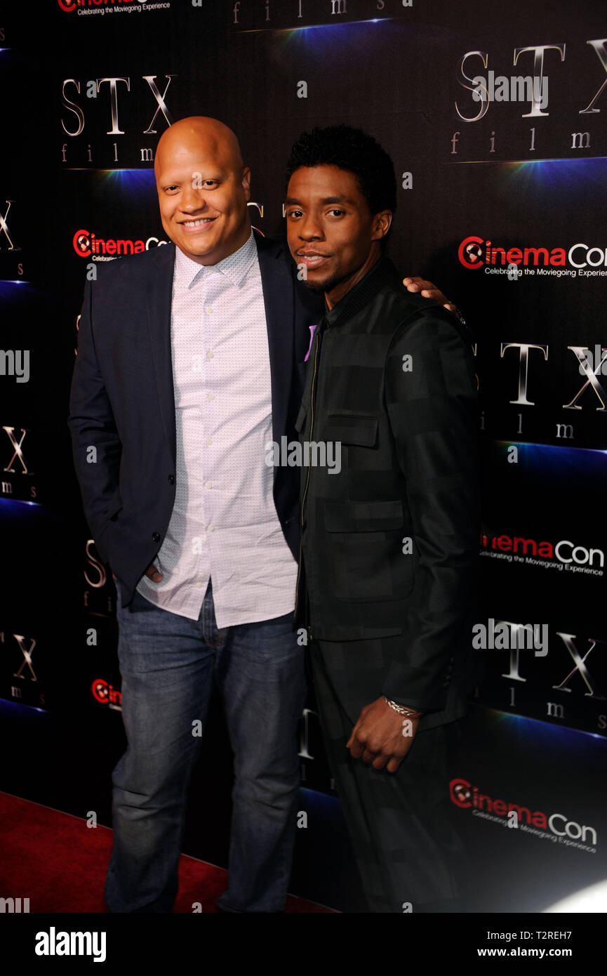 (L-R) Producer Logan Coles and Actor Chadwick Boseman arrives at the ...