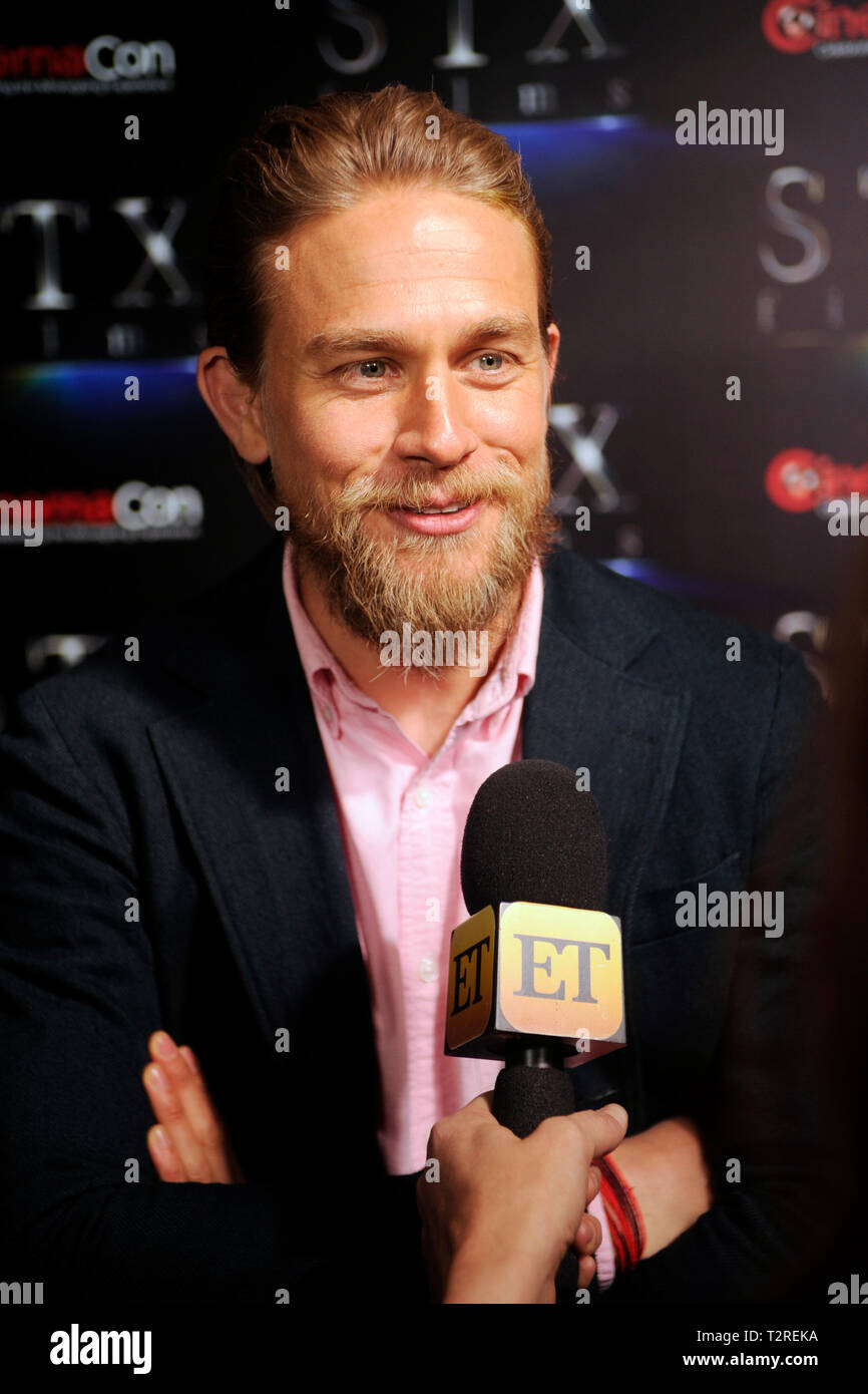 Actor Charlie Hunnam arrives at the STXfilms presentation red carpet ...