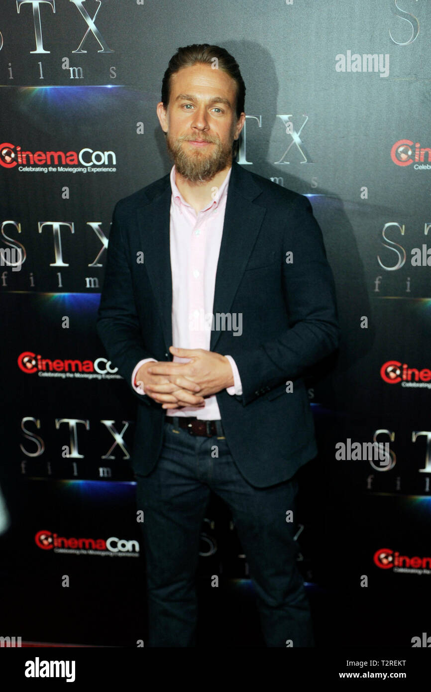 Actor Charlie Hunnam arrives at the STXfilms presentation red carpet ...