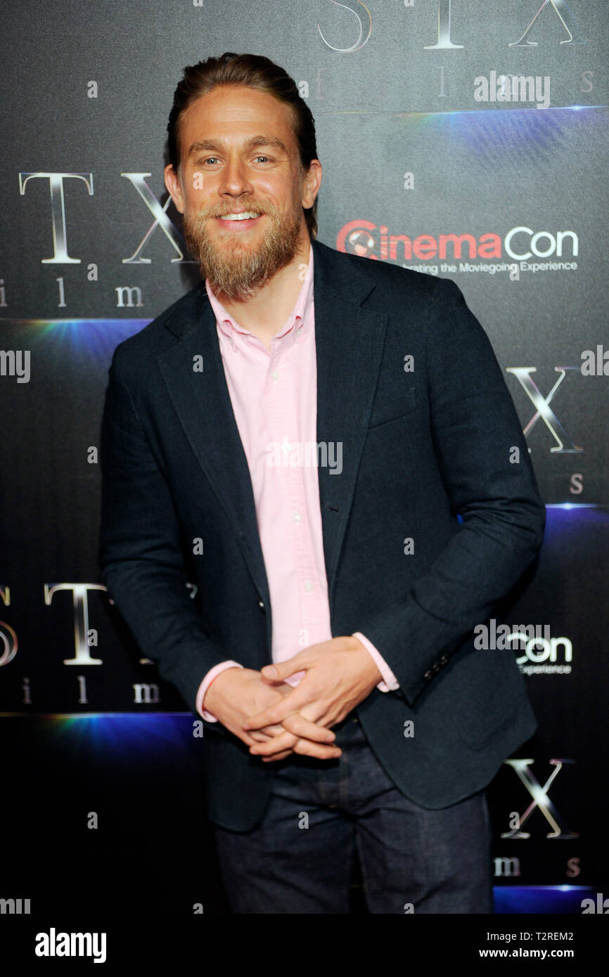 Actor Charlie Hunnam arrives at the STXfilms presentation red carpet ...