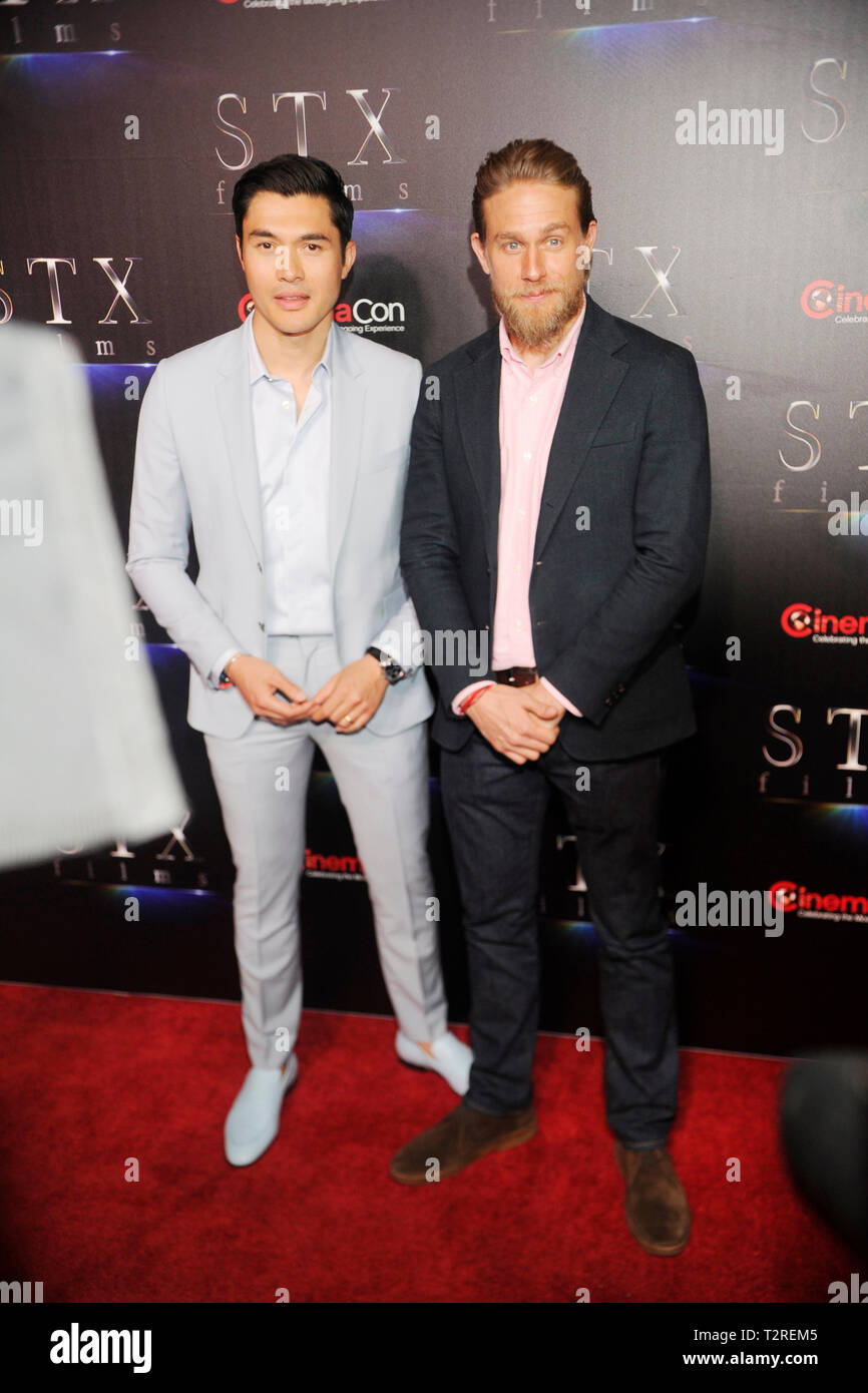 Actors Henry Golding and Charlie Hunnam arrives at the STXfilms ...