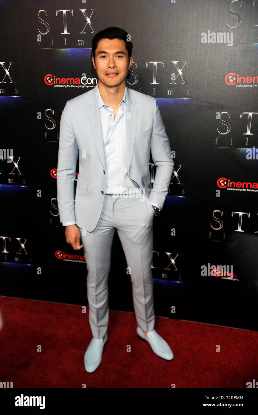 Actor Henry Golding arrives at the STXfilms presentation red carpet for ...