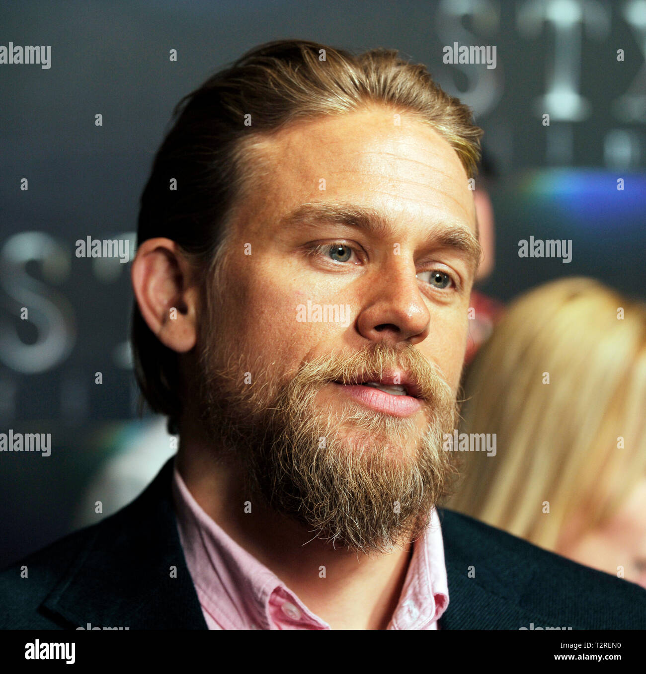Actor Charlie Hunnam arrives at the STXfilms presentation red carpet ...