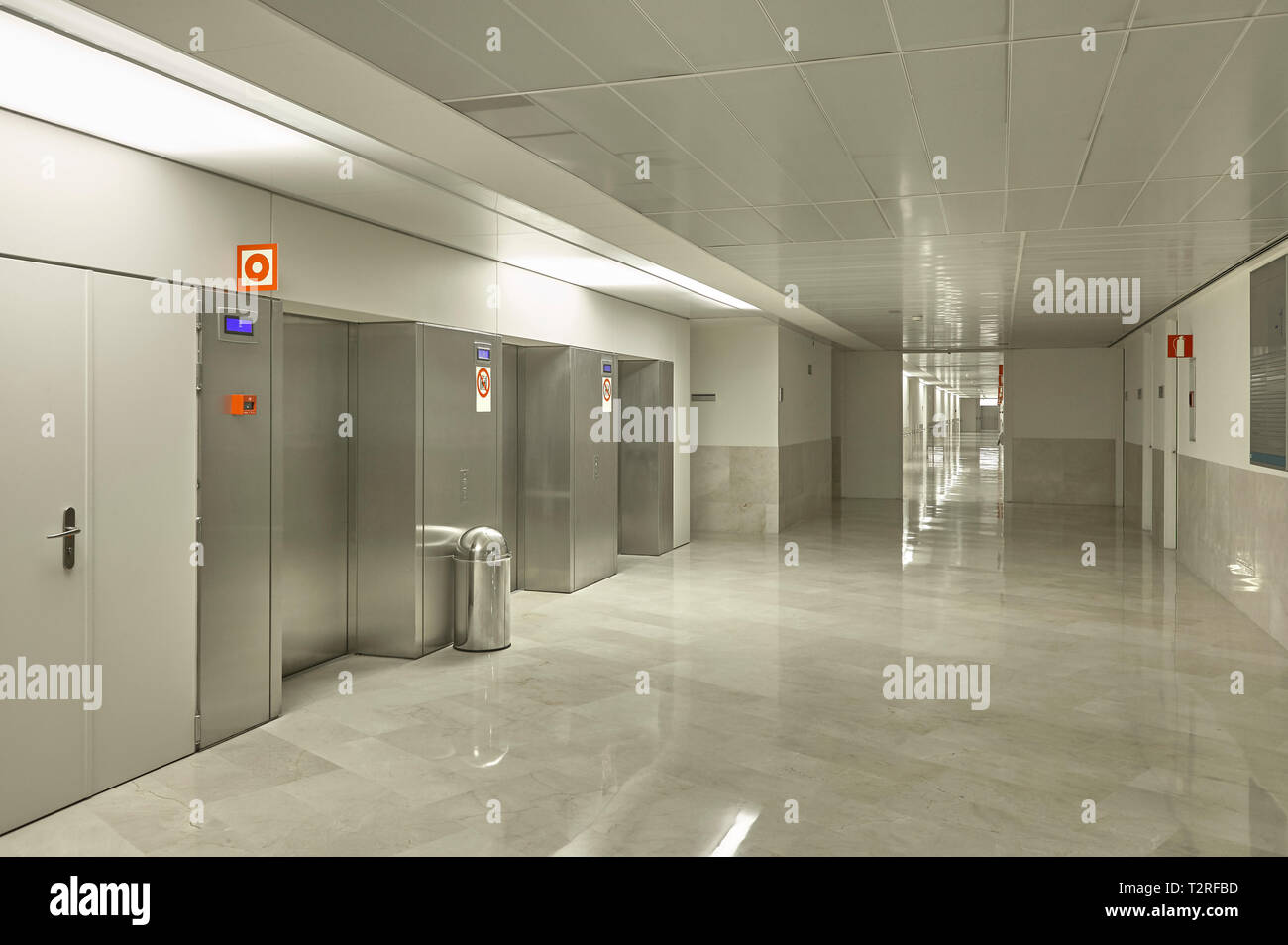 Modern building interior elevators area with marble floor. Architecture ...