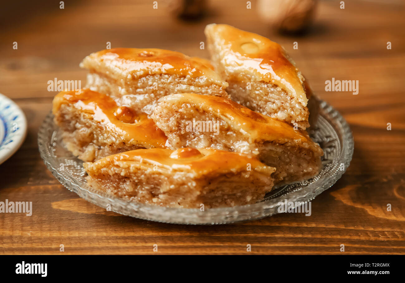 Baklava with nuts on a wooden background. Selective focus. food and ...