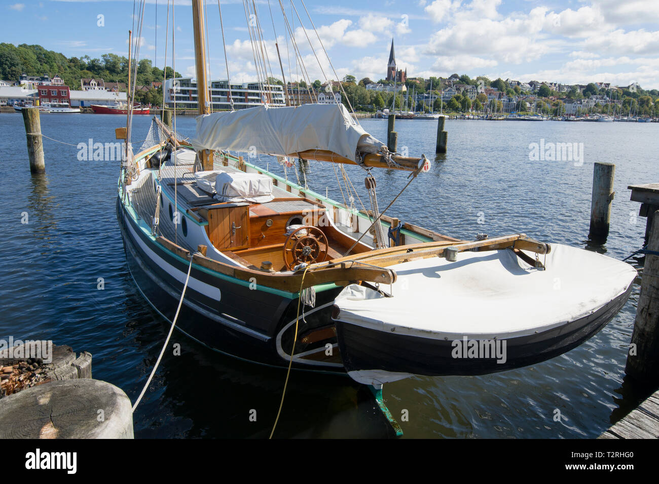 modern sailing boat white ,yacht at harbour Stock Photo - Alamy