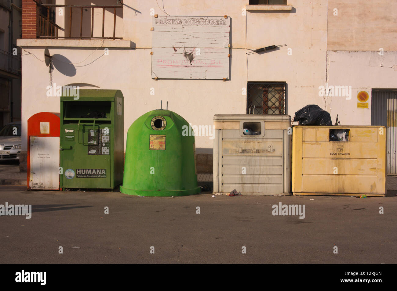 Various types of garbage containers arranged in a square for the ...