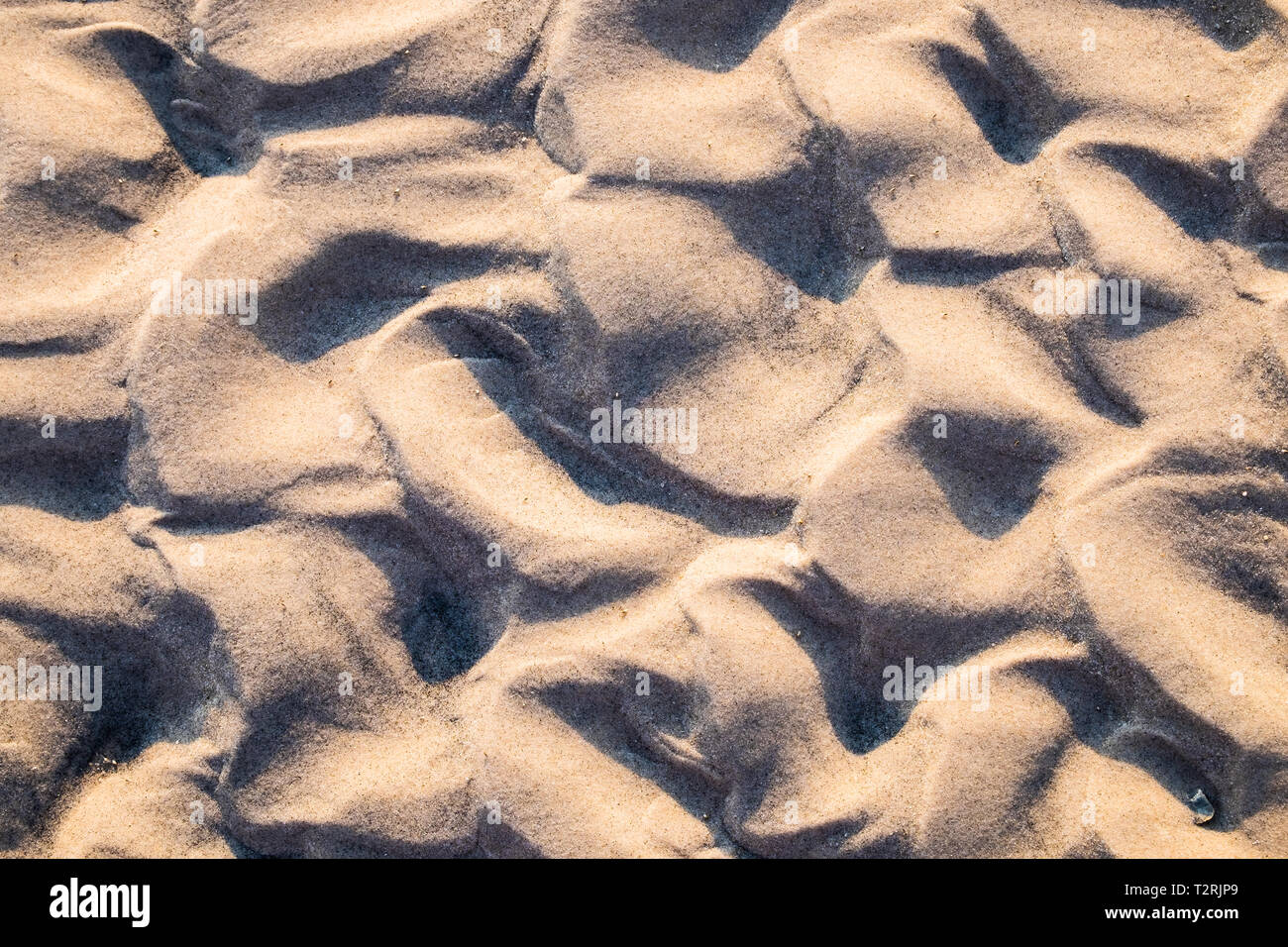 Beach sand abstract furrow pattern background Stock Photo - Alamy