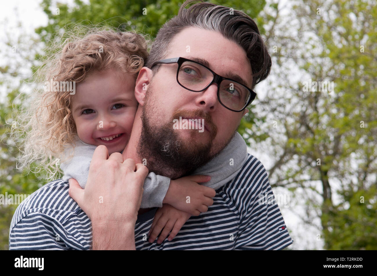 Arms around neck hi-res stock photography and images - Alamy