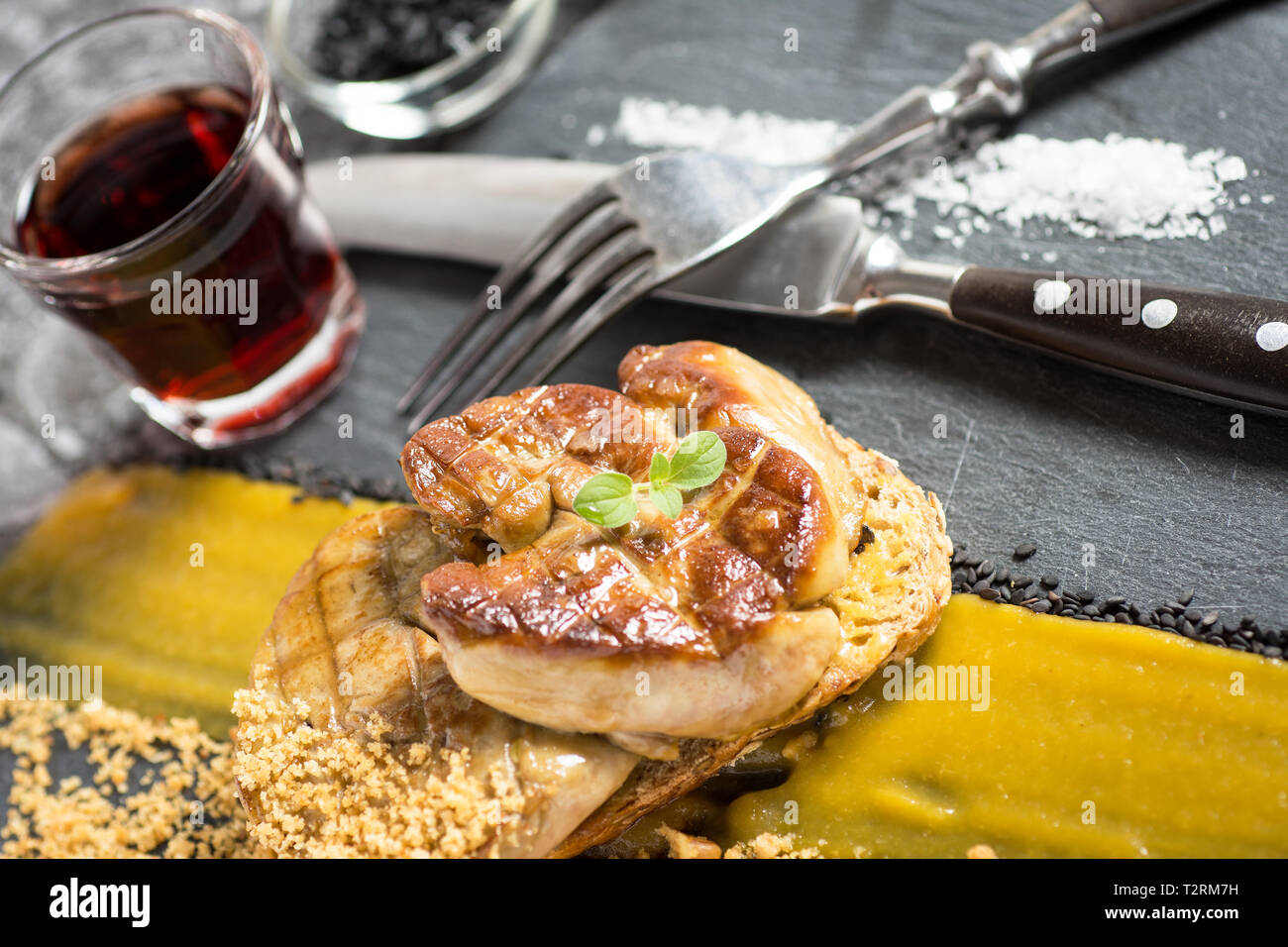 Foie Gras with Mango Puree on Dark Stone Background. French Cuisine ...