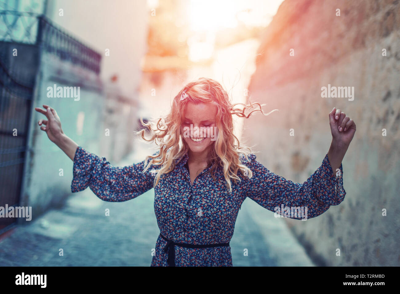 Woman happy dancing hi-res stock photography and images - Alamy