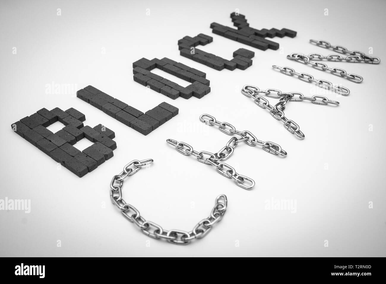 Blockchain illustration written with bricks and chains on white ...