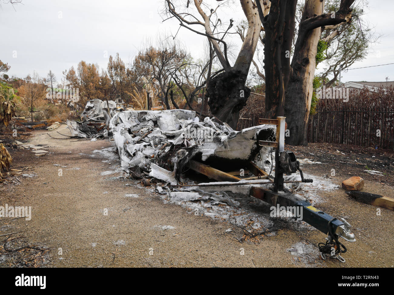 Burned Yacht on Trailer in Driveway Stock Photo - Alamy