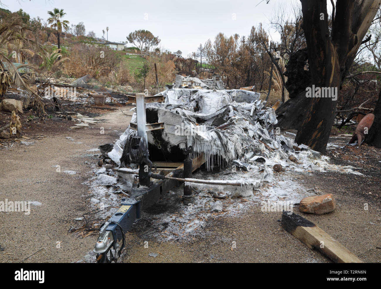 Burned Yacht on Trailer in Driveway Stock Photo - Alamy