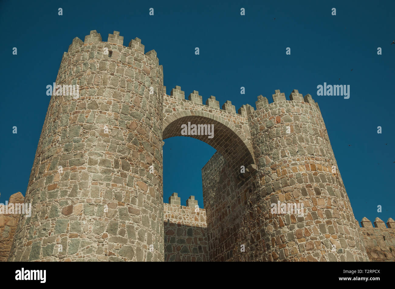 Upper part of the Alcazar Gate between two towers in the stone city ...