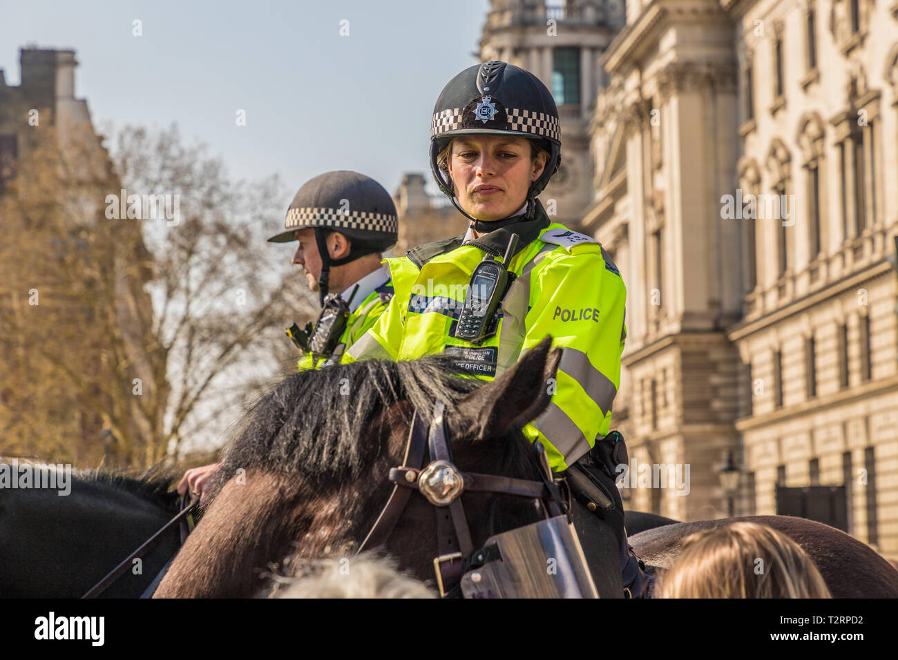 Female police officer riding horse hi-res stock photography and images ...