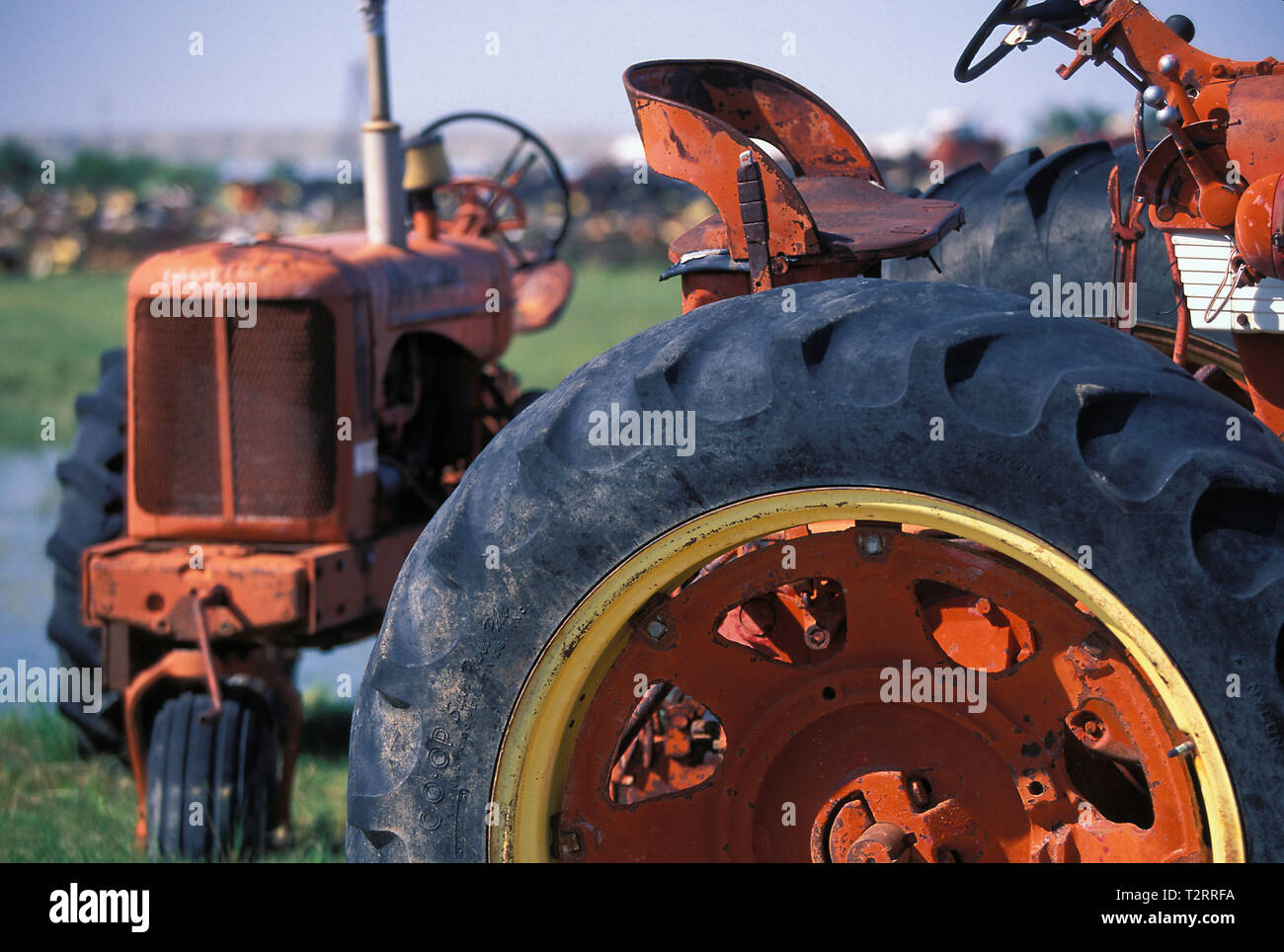 Junkyard full of obsolete farm equipment Stock Photo - Alamy