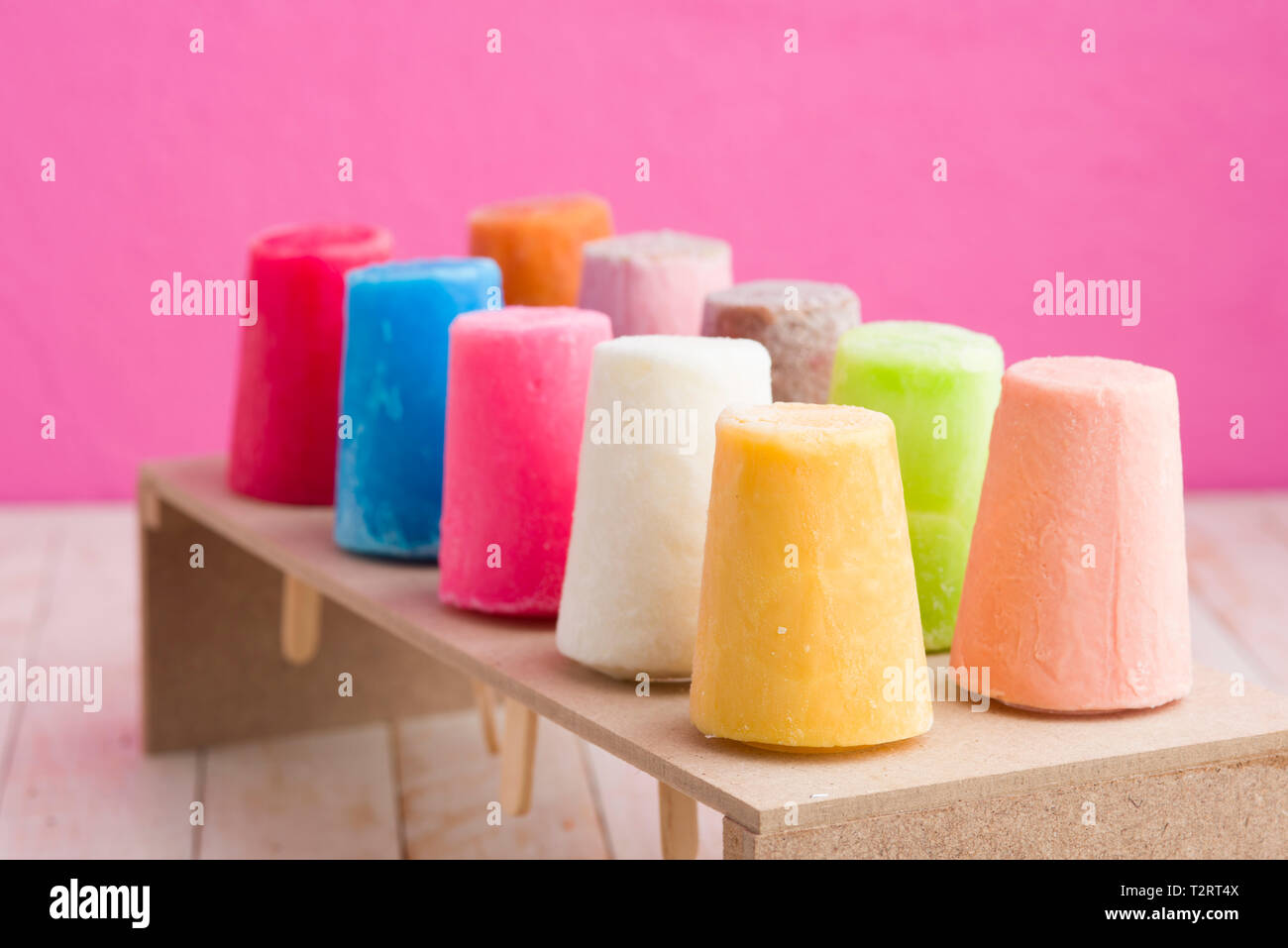 Different colors iced popsicles Stock Photo - Alamy