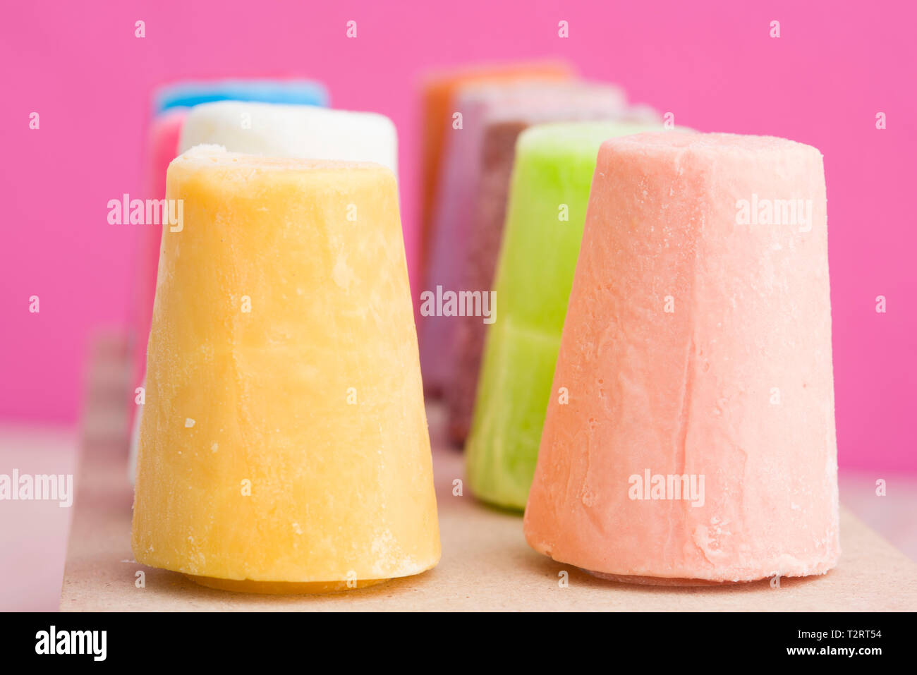 Different colors iced popsicles Stock Photo - Alamy