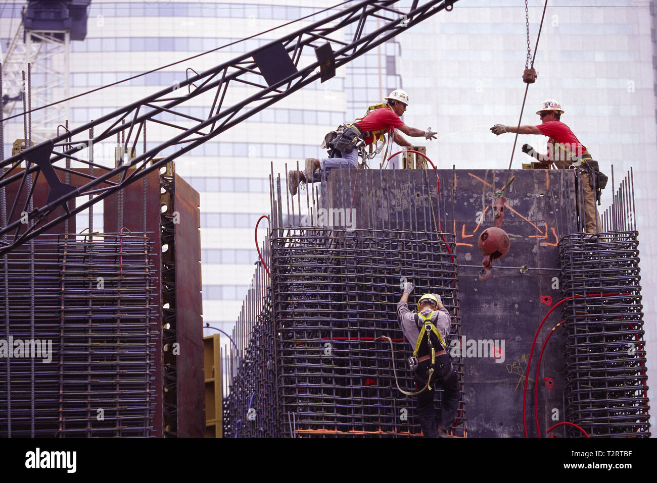 Steel work is working with rebar on new building construction in ...