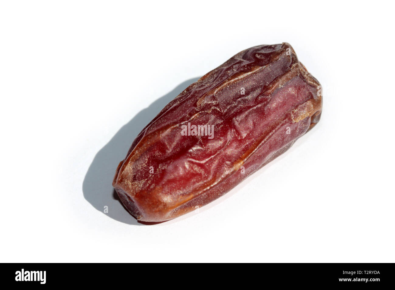 Dried date palm in white background Stock Photo - Alamy