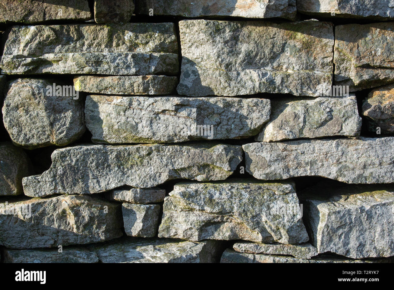Drystone wall on farmland. Built entirely from stone these walls form ...