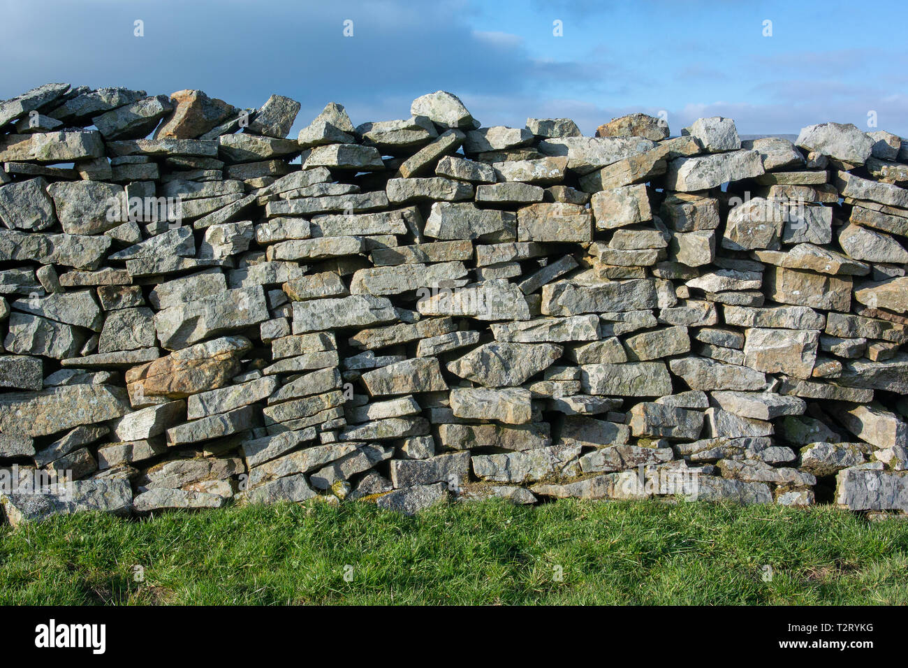 Drystone wall on farmland. Built entirely from stone these walls form ...