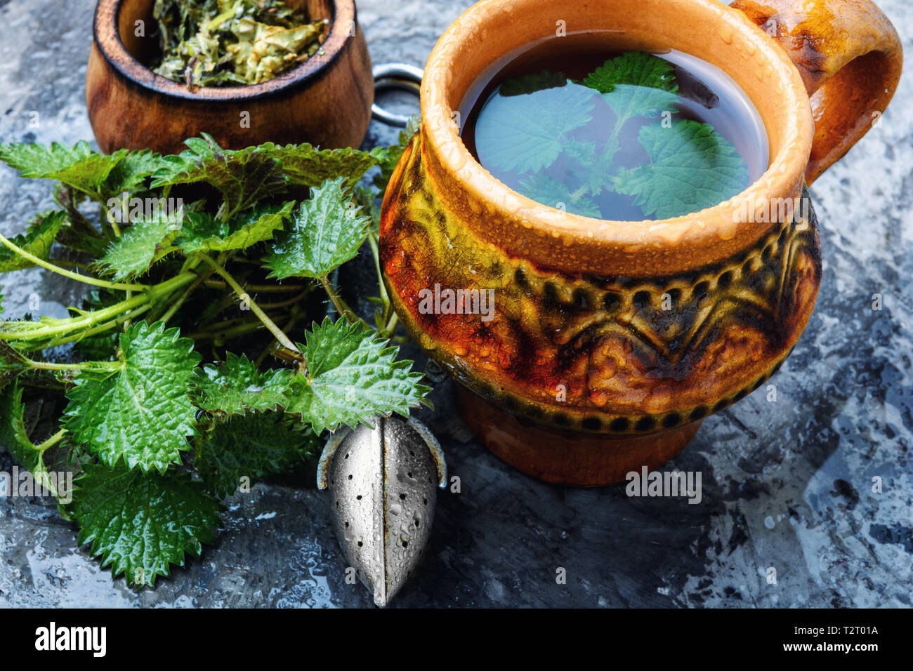 Cup of healthy herbal tea with nettle.Nettle tea in glass Stock Photo ...