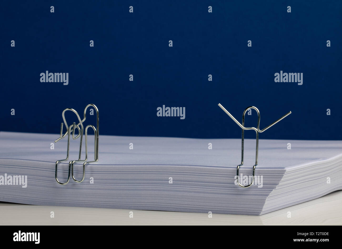Paper Clip Couple Embracing with Jealous Onlooker Stock Photo - Alamy Paper Clip Couple Embracing with Jealous Onlooker Stock Photo - Alamy