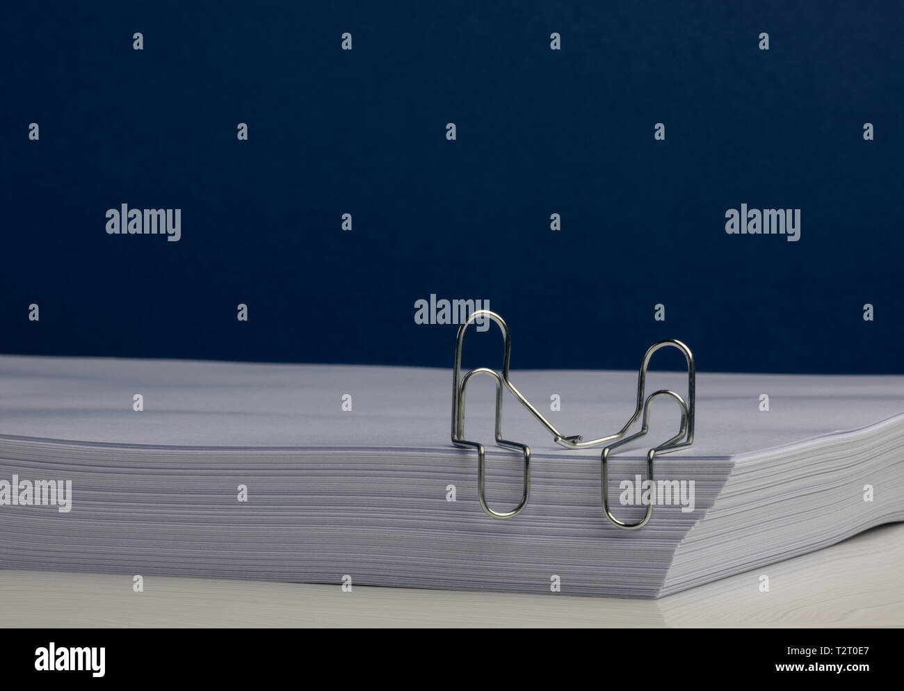 Two Paper Clip Characters Holding Hands Stock Photo - Alamy