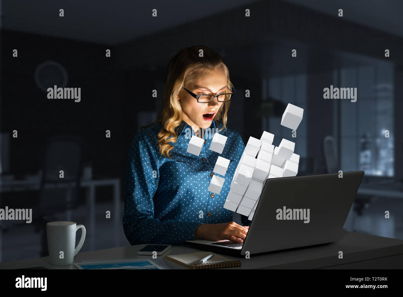 Surprised beautiful girl looking in glowing laptop screen. Mixed media ...