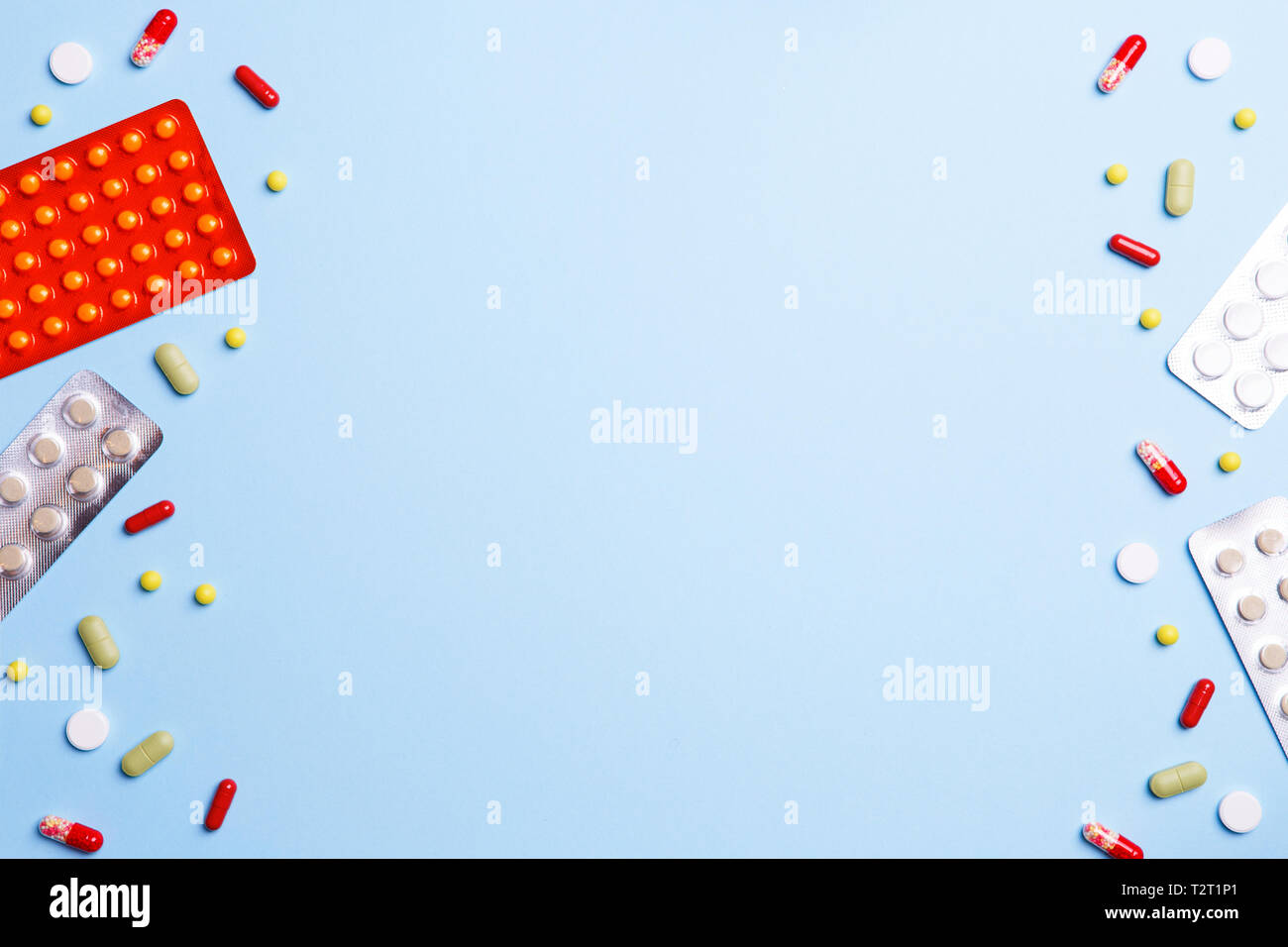 Cold medicine on a blue background. Cold and Flu Treatment Stock Photo ...