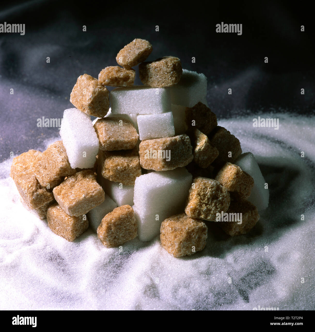 Heap of mixed white and red sugars Stock Photo - Alamy