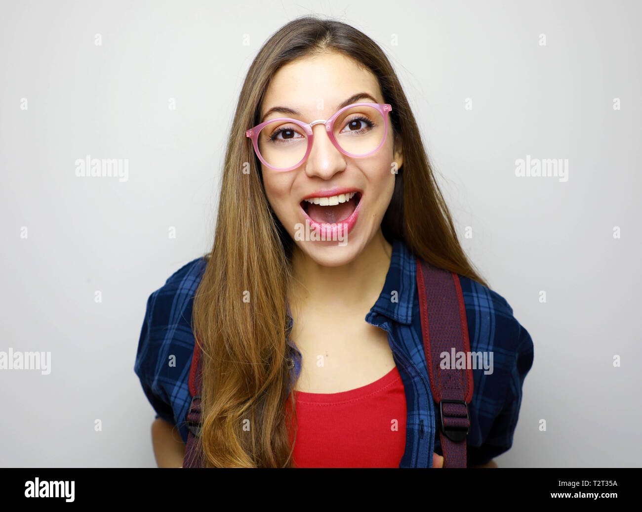 Excited female college university student isolated on white background ...