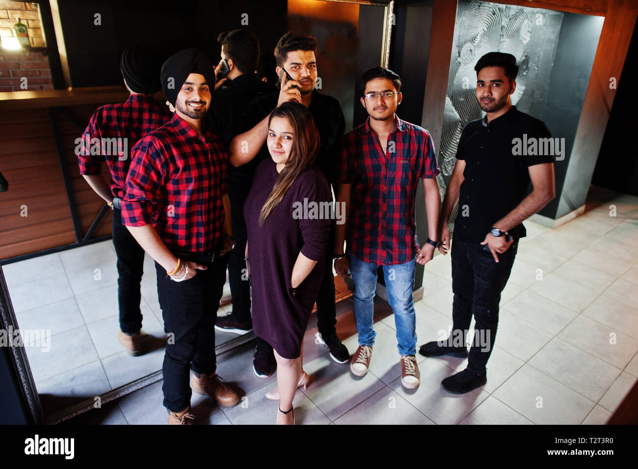Indian friends having party at the club hi-res stock photography and ...