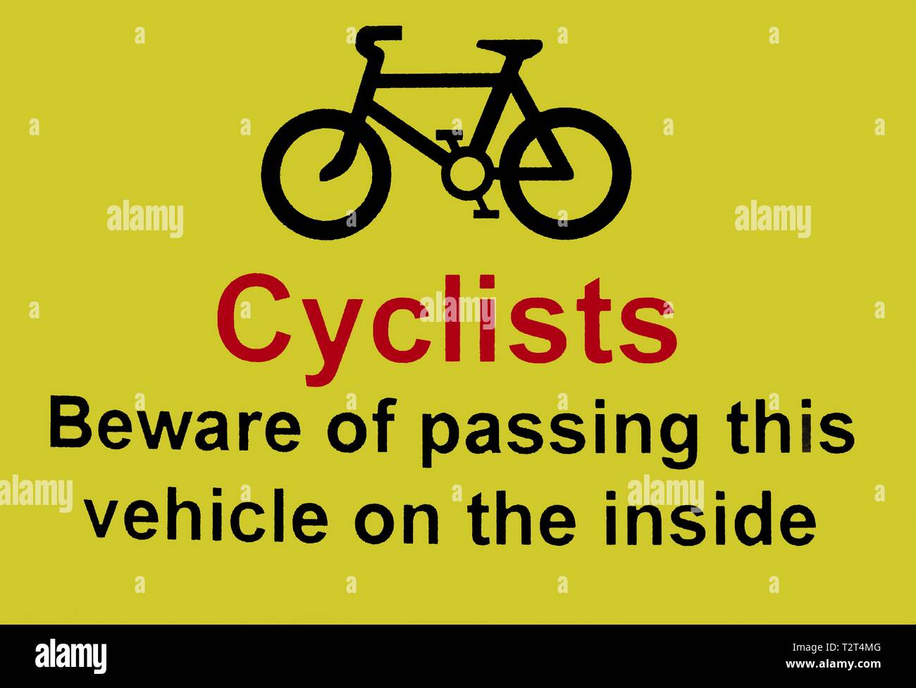 Cyclists beware of passing the vehicle on the inside warning sign Stock ...