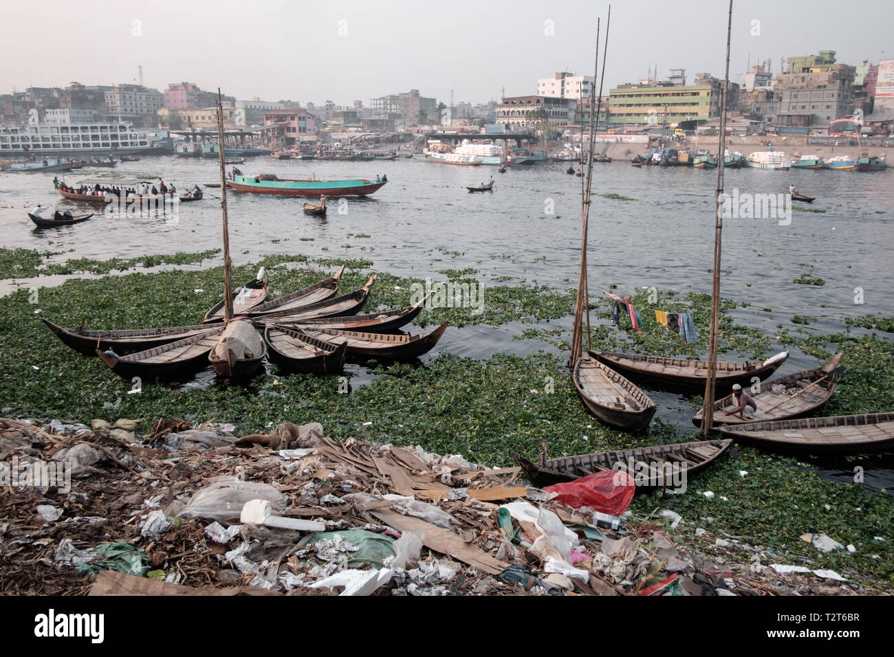 Pile of trash on the very polluted Buriganga river's bank, Zinzira ...