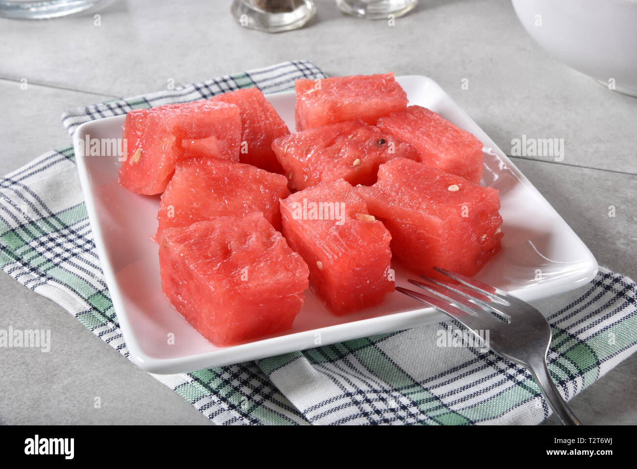 A plate of bite sized cubes of fresh watermelon Stock Photo - Alamy
